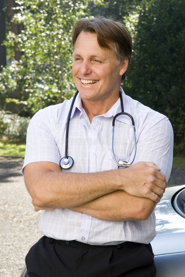 A happy smiling doctor stock image. Image of cheerful - 6552855