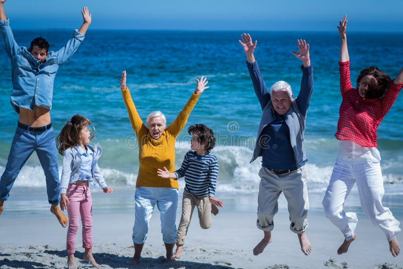 Happy Smiling Family Jumping Together Stock Image - Image of love ...