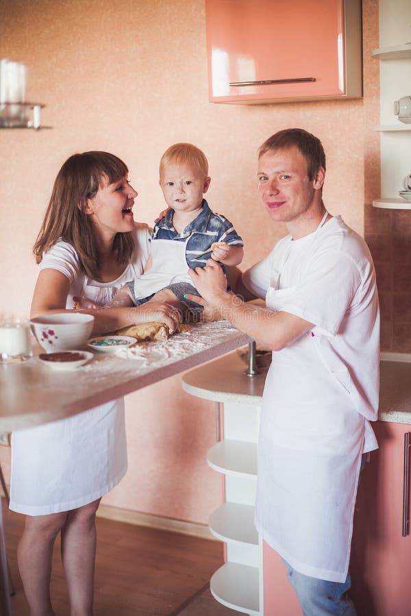 Happy Smiling Family at Kitchen Stock Image - Image of preparing ...