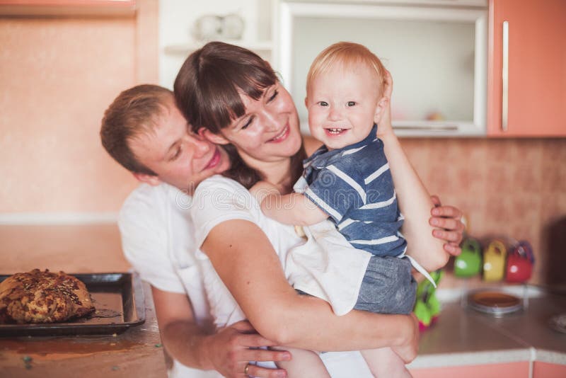Happy Smiling Family at Kitchen Stock Photo - Image of kitchen, smiling ...