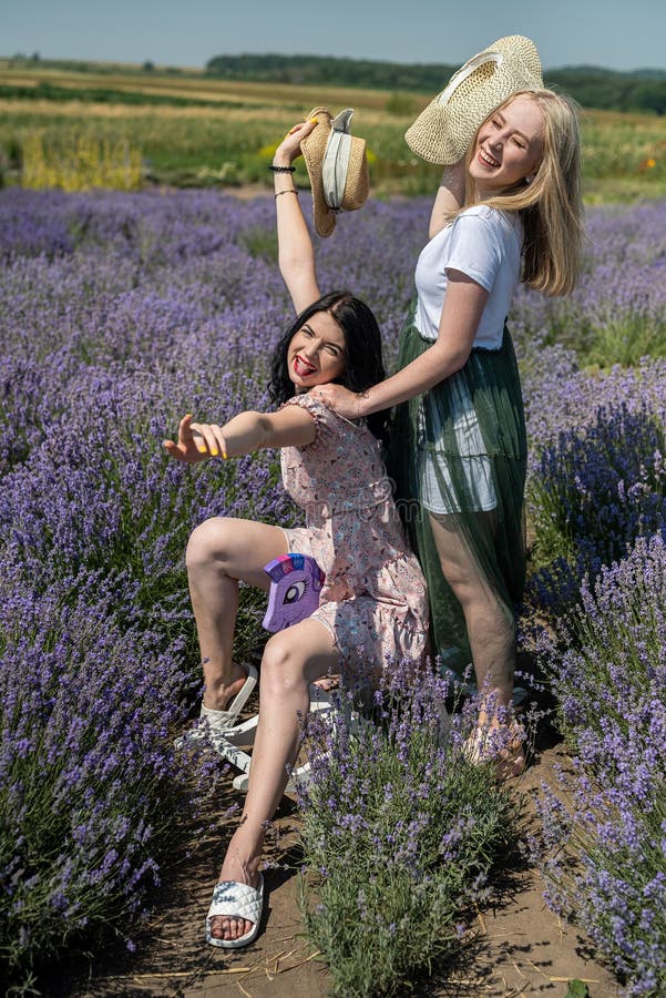 Happy and Smiling Friends in Sunlight in Lavender Field Stock Image ...