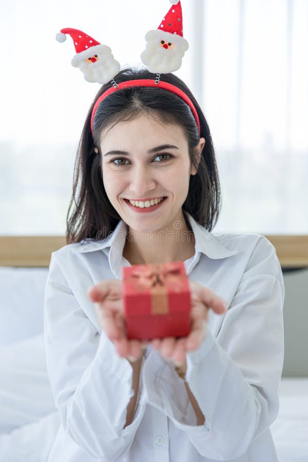 A Happy Smiling Girl Holding Present Red Gift Box. Smiling Girl Holding ...