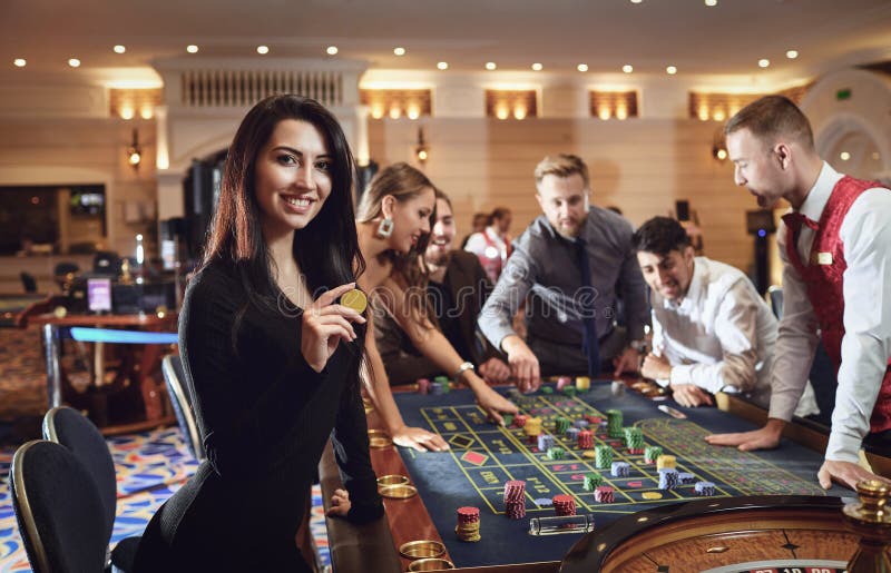 Happy Smiling Girl Smiling at the Roulette in a Casino Stock Image ...