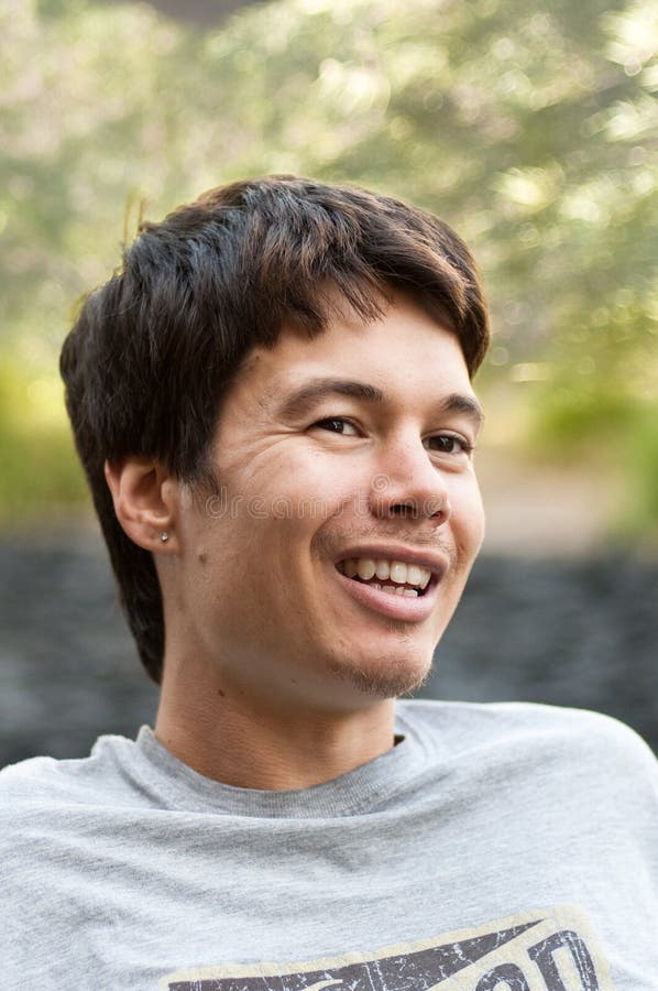 A happy smiling guy stock image. Image of satisfied, young - 10964521