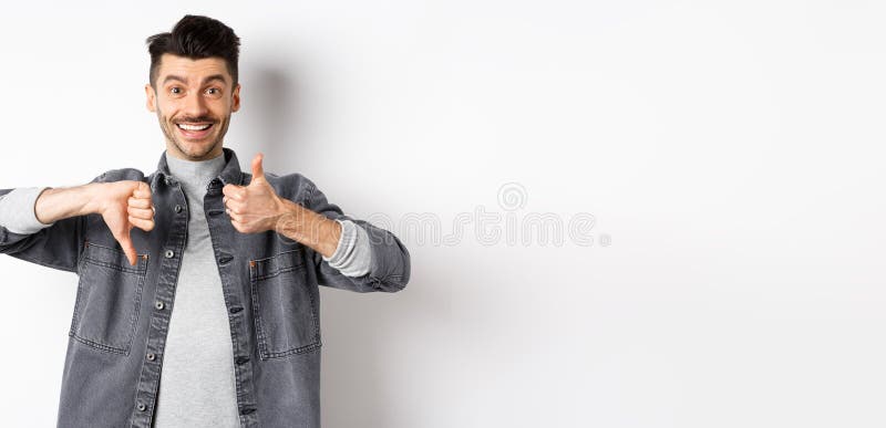 Happy Smiling Guy Showing Average Gesture, Thumbs Down Up, Cant Decide ...