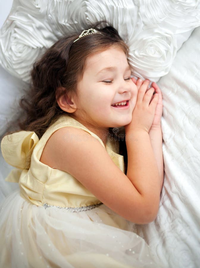 Happy smiling kid sleeping stock image. Image of comfort - 40985751
