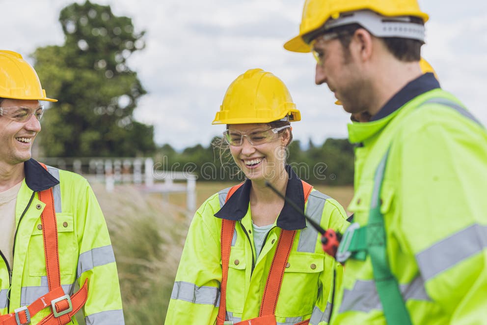Happy Smiling and Laughing Engineer Team Workers Talking Together Relax ...