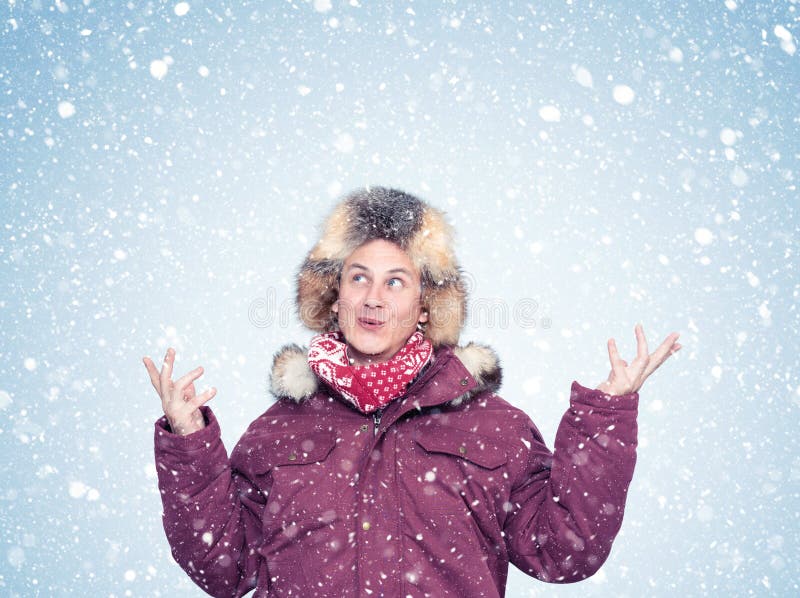 Happy Smiling Man in Winter Clothes Rejoices in Falling Snow Stock ...