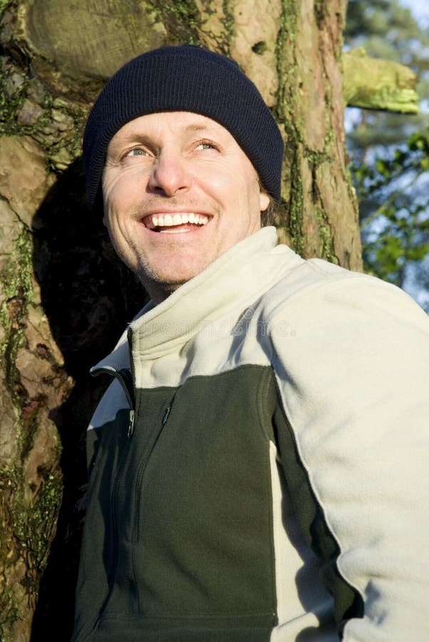 Happy smiling outdoor man stock image. Image of forest - 13054547