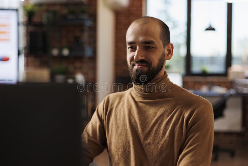 Happy Smiling Professional Office Worker Looking at Financial Graphs ...