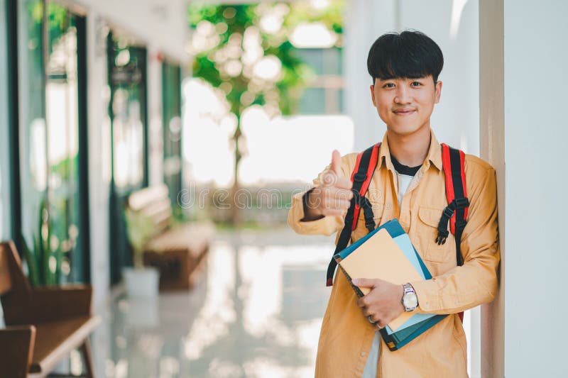 Happy Smiling Student with Book in Hand on Campus while Going To Study ...