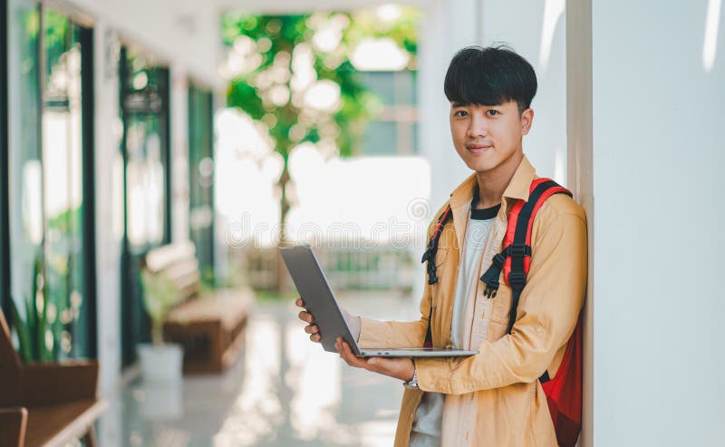 Happy Smiling Student with Book in Hand on Campus while Going To Study ...