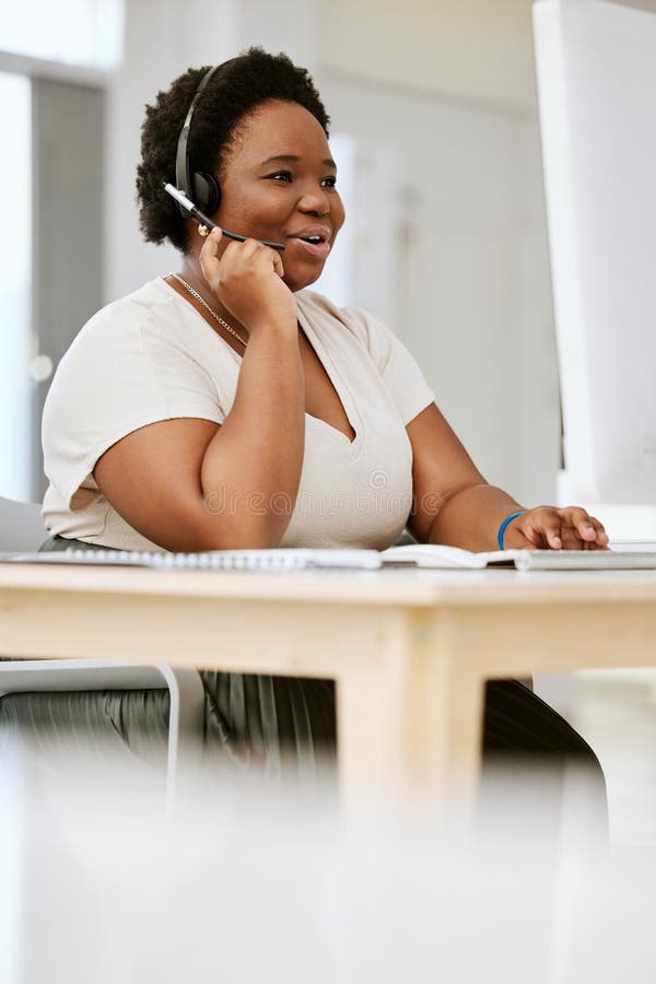 Happy, Smiling and Talking Call Center Agent Working on Computer ...