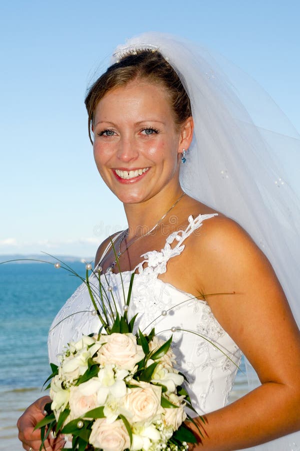 Happy Smiling Wedding Bride with Bouquet Stock Photo - Image of ...