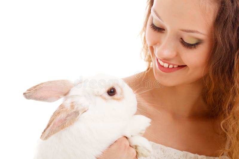 A Female Vet Holding a Rabbit Stock Photo - Image of blonde, animal ...