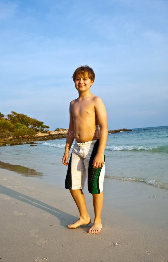 Cute Little Boy at the Beach Stock Image - Image of people, male: 13864241