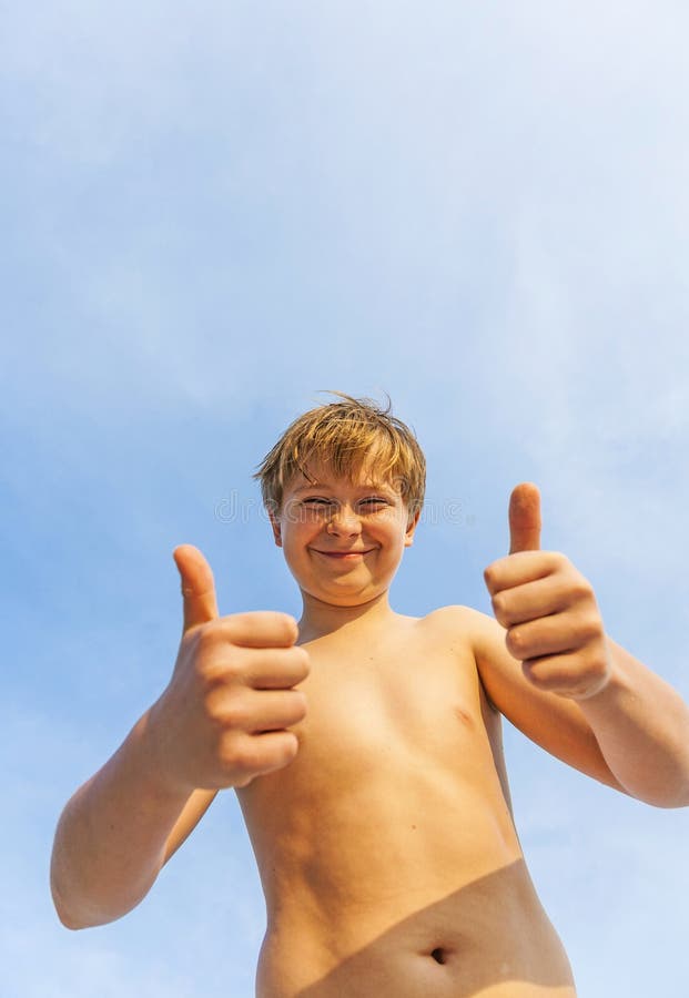 Happy Smiling Young Boy is Posing at the Beach Stock Photo - Image of ...