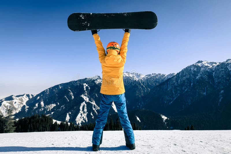 Snowboarder with Snowboard on Winter Mountain Top Stock Photo - Image ...