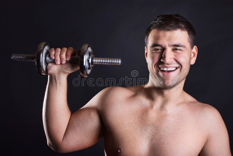 Happy sportsman is in gym stock image. Image of health - 20164749