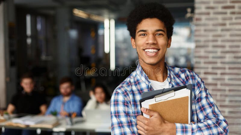 Happy Student with Books Looking at Camera in Library Stock Image ...