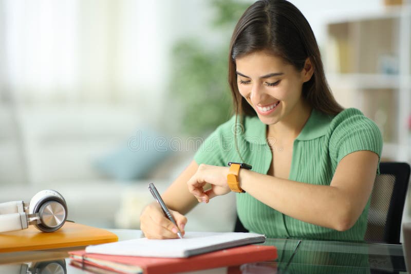 Happy Student Checking Smartwatch Taking Notes Stock Image - Image of ...