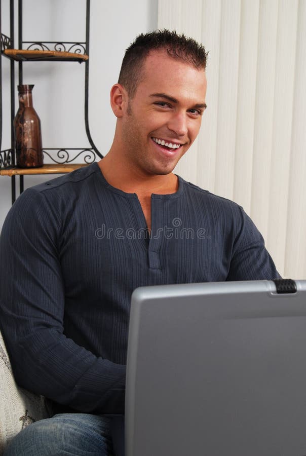 Happy Student with a Computer Stock Photo - Image of handsome, young ...
