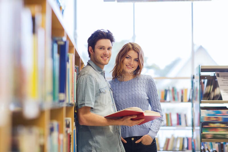Happy Student Couple with Books in Library Stock Image - Image of happy ...