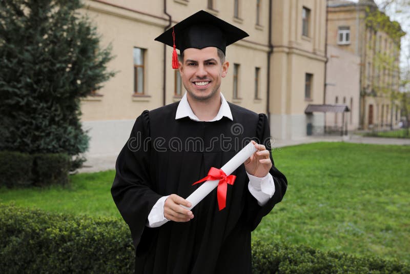 Happy Student with Diploma after Graduation Ceremony Outdoors Stock ...