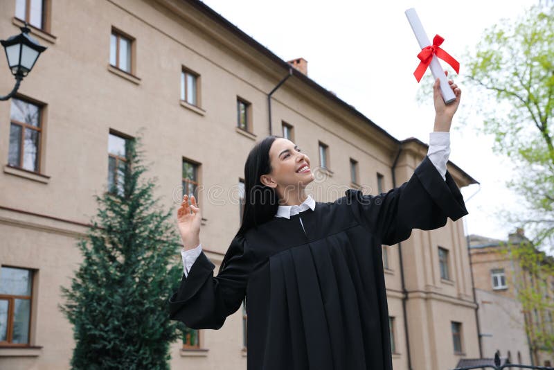Happy Student with Diploma after Graduation Ceremony Outdoors Stock ...
