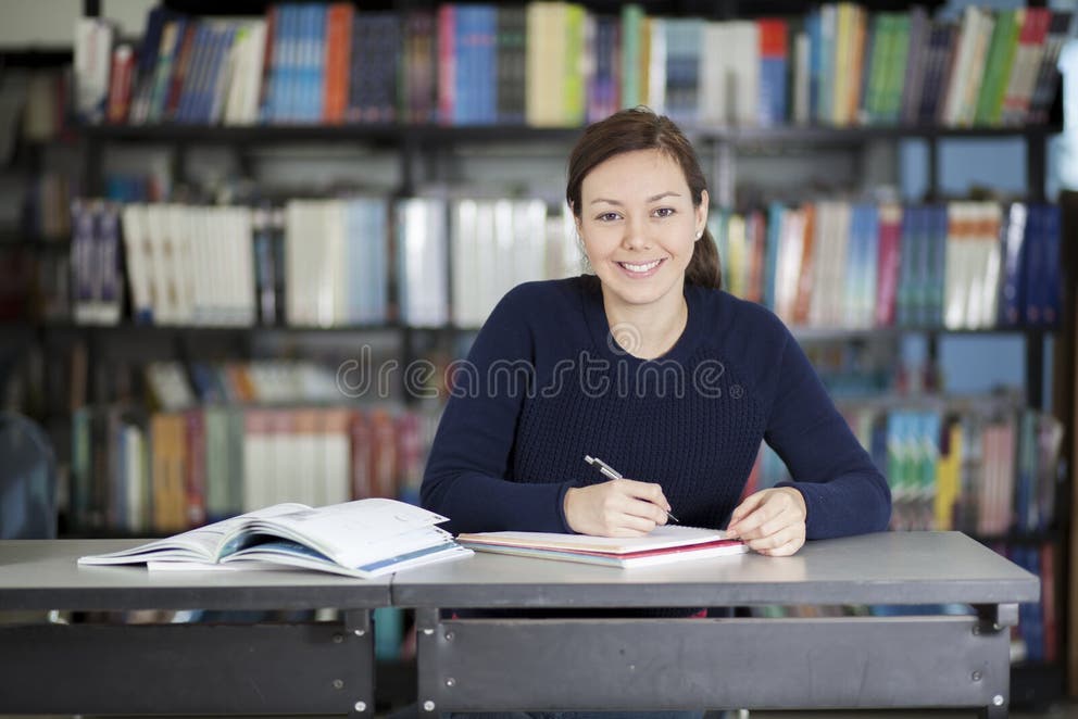 Happy Student Doing Homework Stock Photo - Image of female, young: 34348886