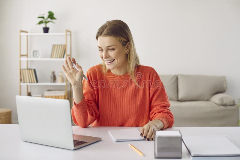 Happy Student Having Online Class on Laptop, Waving Hello and Writing ...