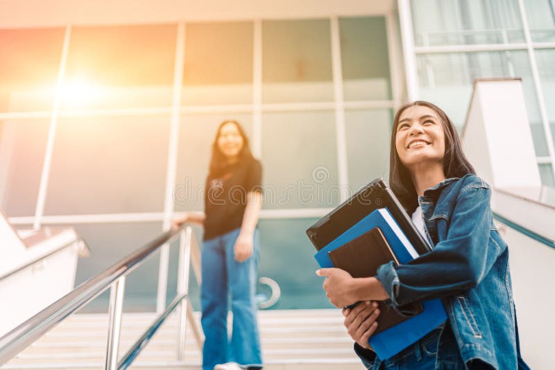 Happy Student Hold Book at University. Stock Image - Image of academic ...