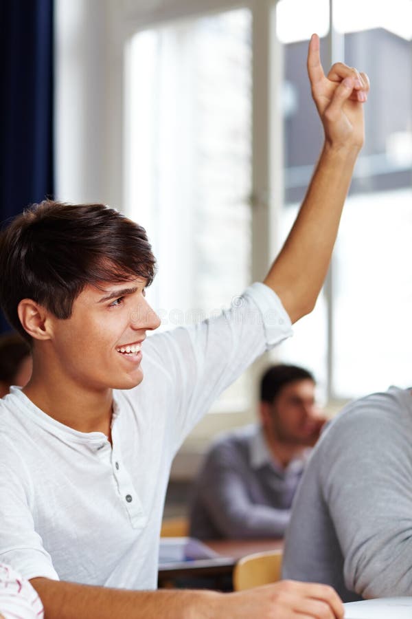 Student Lifting Hand in University Stock Image - Image of exam, dual ...