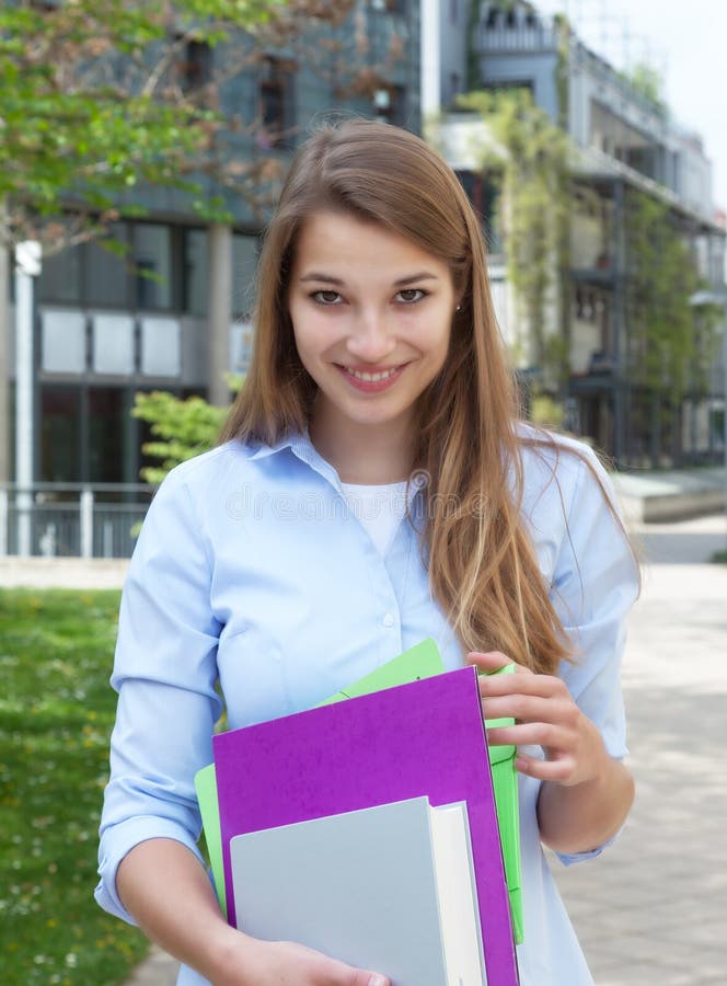 Happy Student with Long Blond Hair on Campus Stock Image - Image of ...