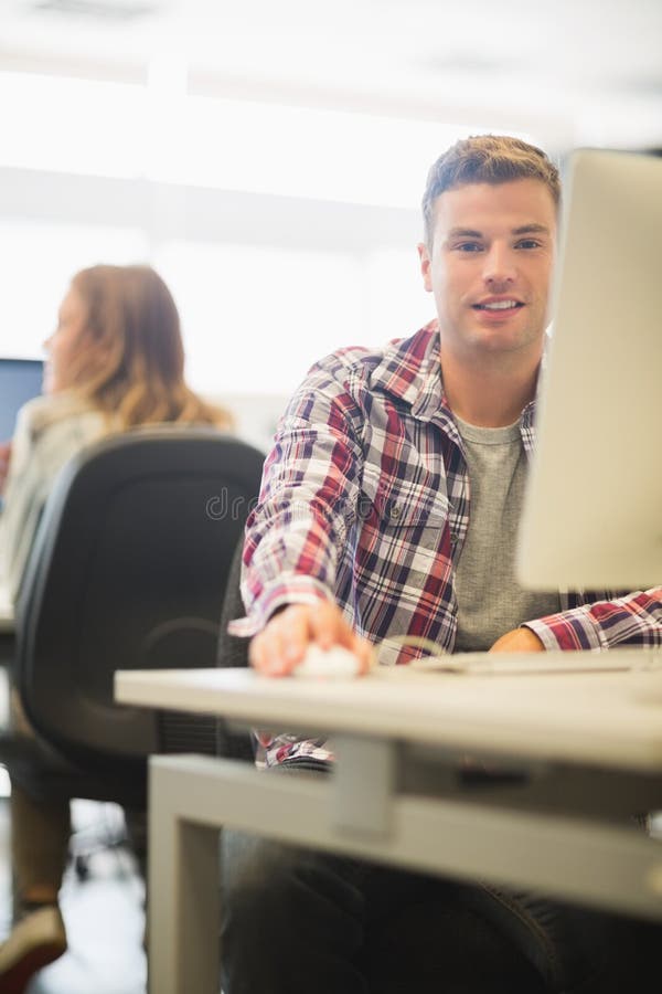 Happy Student Looking at Camera in the Computer Room Stock Image ...