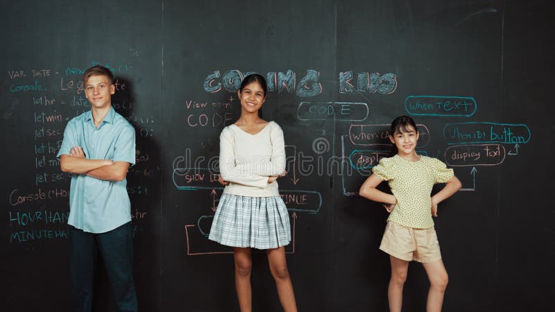 Student Pose at Camera while Standing at Blackboard with Code ...