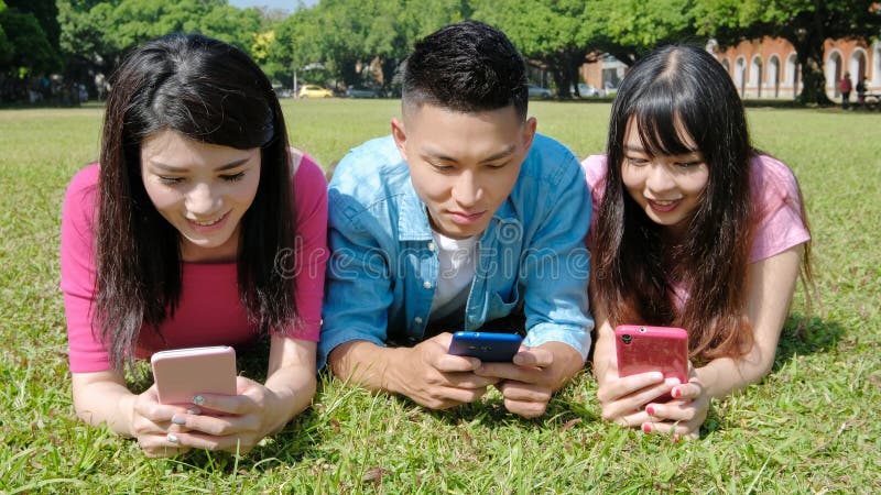 Happy student play phone stock image. Image of happy - 105151817
