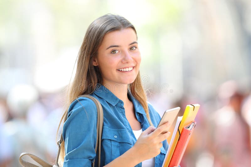 Happy Teen Messaging on Smart Phone in the Street Stock Photo - Image ...