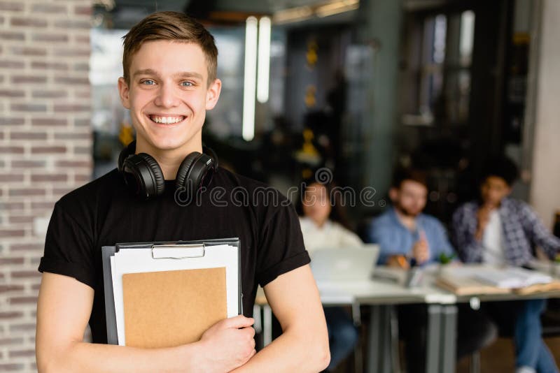 Happy Student Standing in Front of Group of Students Stock Image ...
