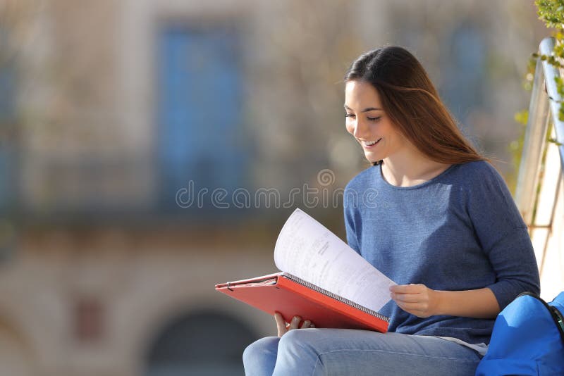 Happy Student Studying Reading Notes in a Campus Stock Photo - Image of ...