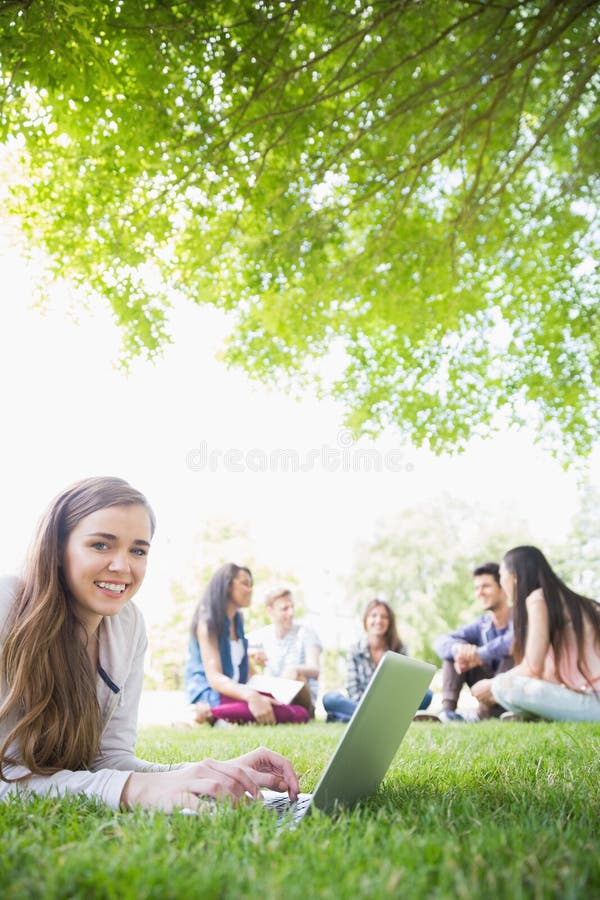 Happy Student Using Her Laptop Outside Stock Photo - Image of teenager ...