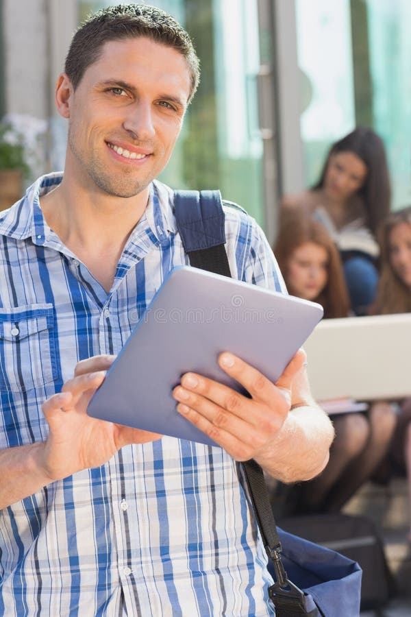 Happy Student Using His Tablet Pc on Campus Stock Image - Image of view ...