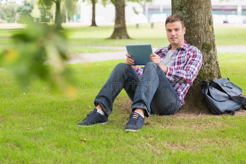 Happy Student Using His Tablet Pc Campus Stock Photos - Free & Royalty ...