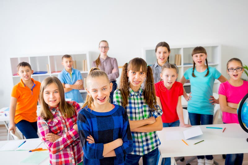 Happy Students in Classroom Stock Photo - Image of elementary, young ...