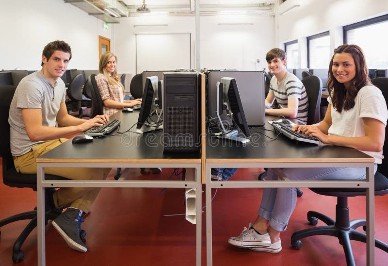 Happy Students in Computer Room Stock Photo - Image of academic ...
