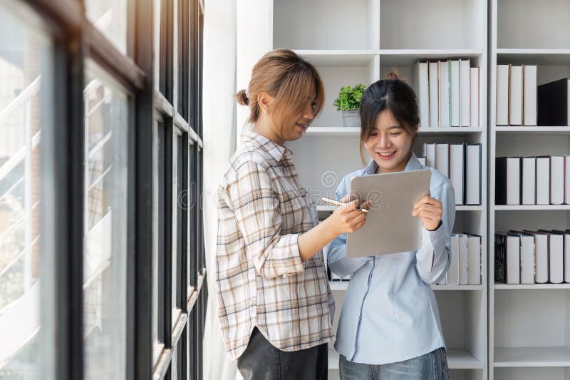 Happy Students Couple in School Library Have Discussion about Project ...