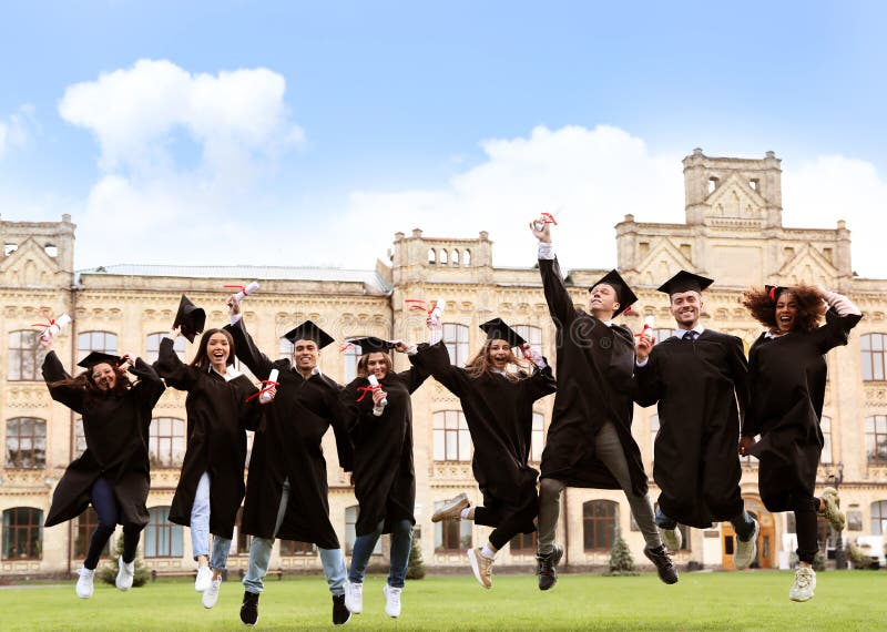 Happy Students With Diplomas. Graduation Ceremony Stock Photo - Image ...