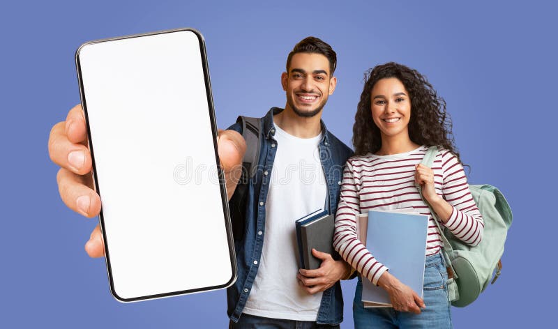Happy Students Holding Books and Smartphone with Blank Screen Stock ...