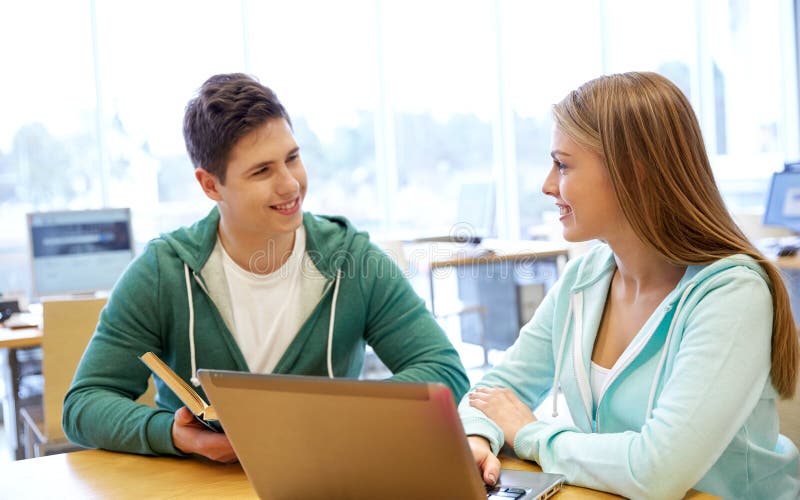 Happy Students with Laptop and Books at Library Stock Photo - Image of ...