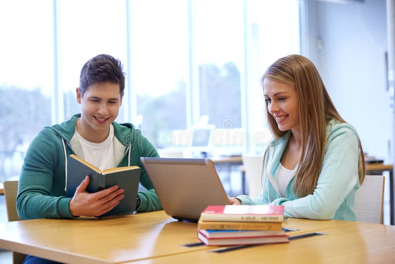 Happy Students with Laptop in Library Stock Photo - Image of ...